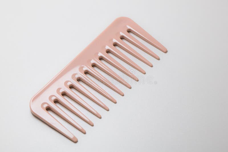 Closeup of Pink Wide-teeth Comb Isolated on White Background Stock ...