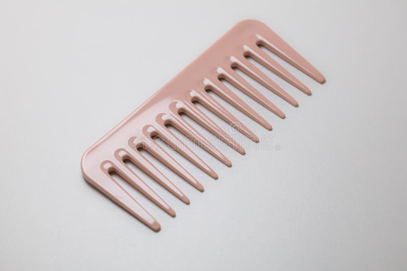 Closeup of Pink Wide-teeth Comb Isolated on White Background Stock ...