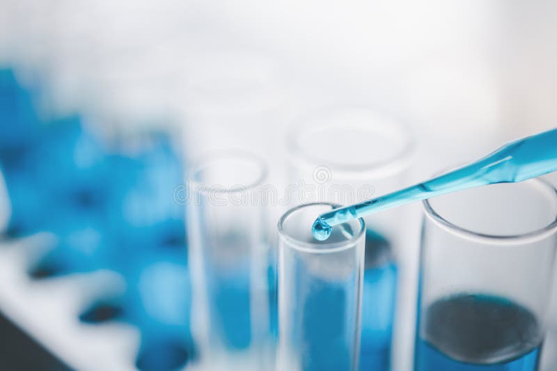Closeup-pipette Dropping a Sample into a Test Tube in an Experiment ...