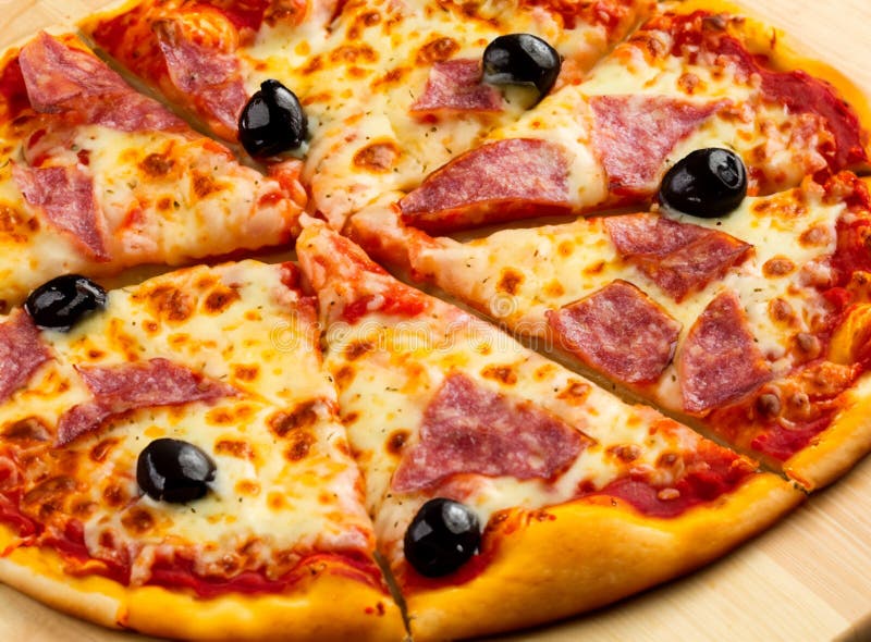 Closeup Pizza Slice, Full Pizza View on a Table Stock Photo - Image of ...
