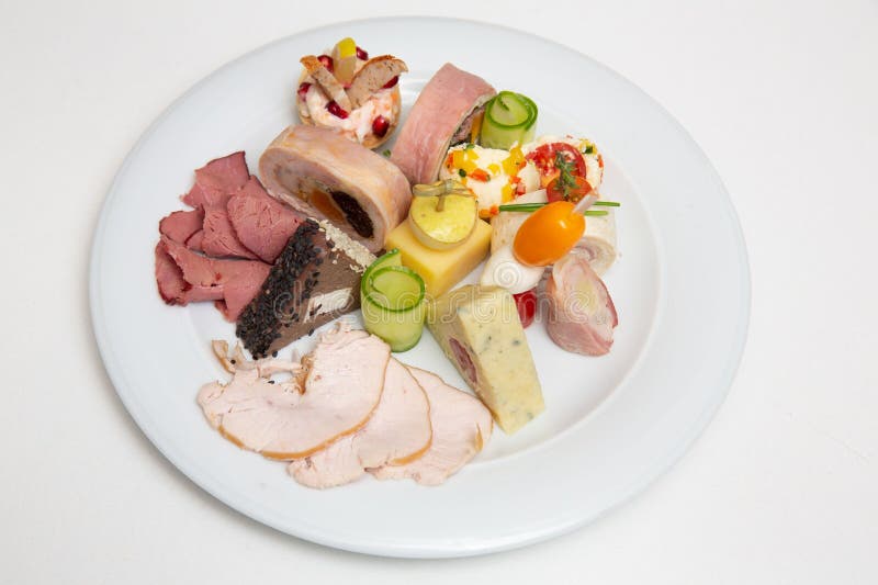 Closeup of a Plate with Different Types of Cheese and Ham. Stock Image ...