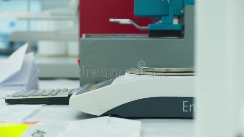 Closeup of Polymer Thread Sample is Weighted on Electronic Scales Stock ...