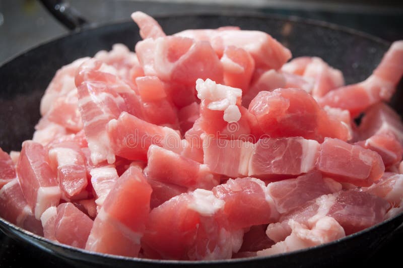 Pork cubes in mini stove stock photo. Image of fresh - 110544858