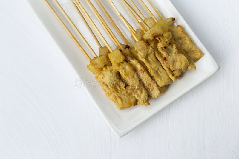 Closeup pork satay stock photo. Image of cooked, delicious - 77999444