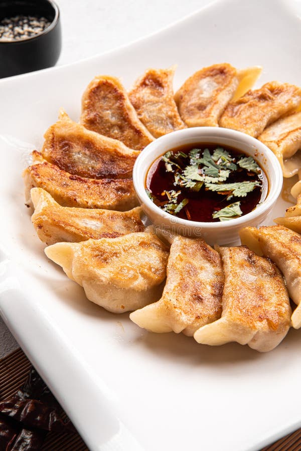 Portion of Asian Roasted Dim Sum Dumplings Stock Photo - Image of ...