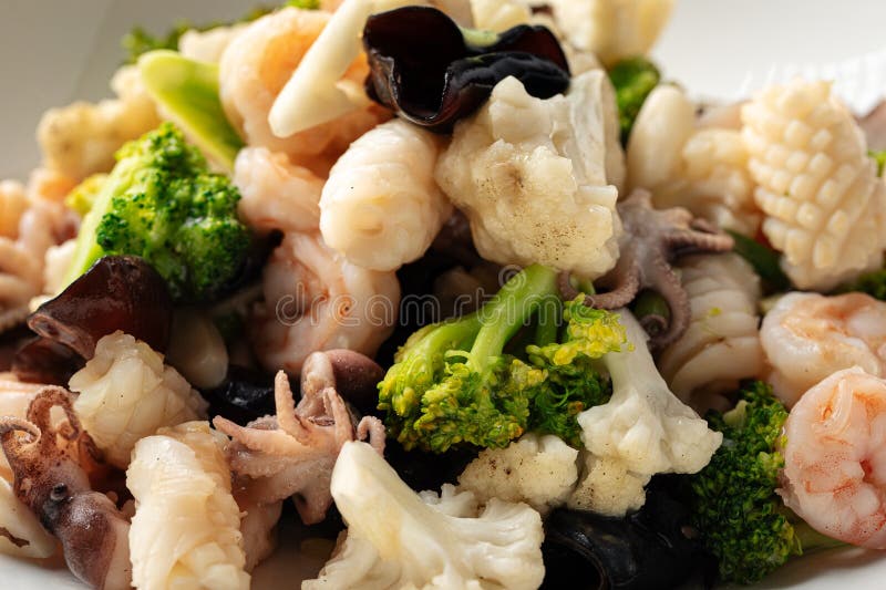 Closeup on Portion of Assorted Seafood Dish Stock Image - Image of ...