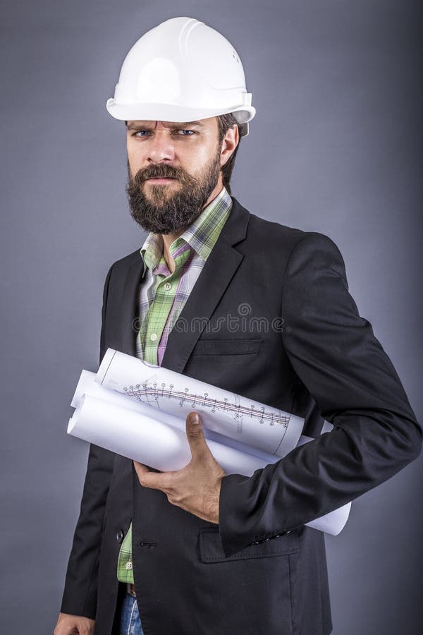 Closeup Portrait of an Angry Engineer Holding Drawings Stock Photo ...