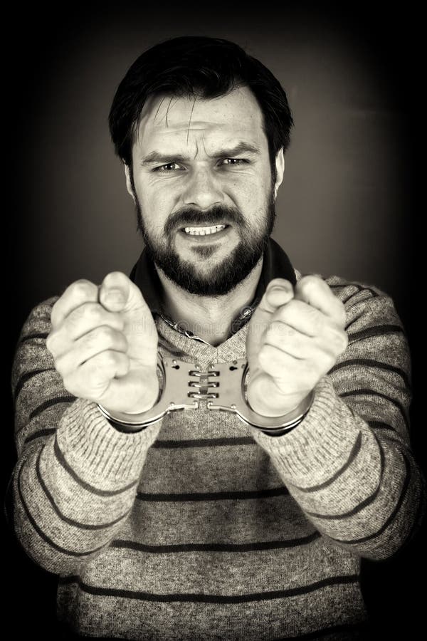 Closeup Portrait of Expressive Young with Handcuffed Hands Stock Image ...
