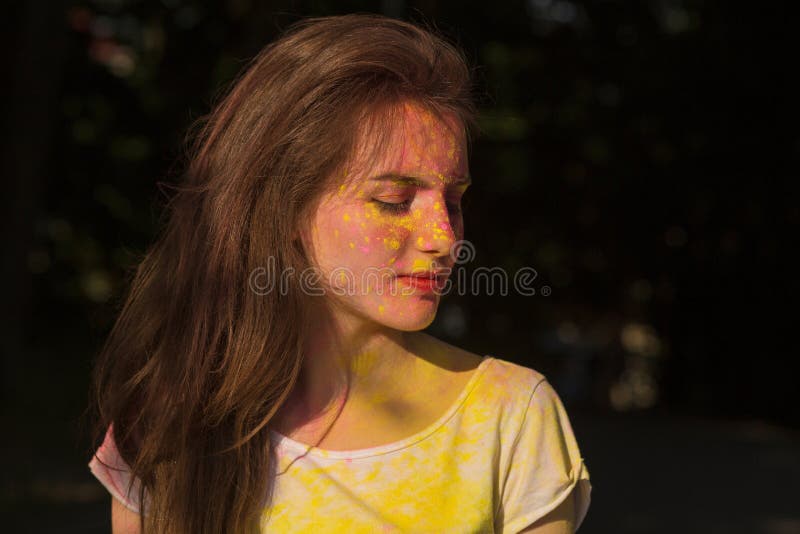 Closeup Portrait Of Lovely Brunette Girl Covered With Yellow And Stock