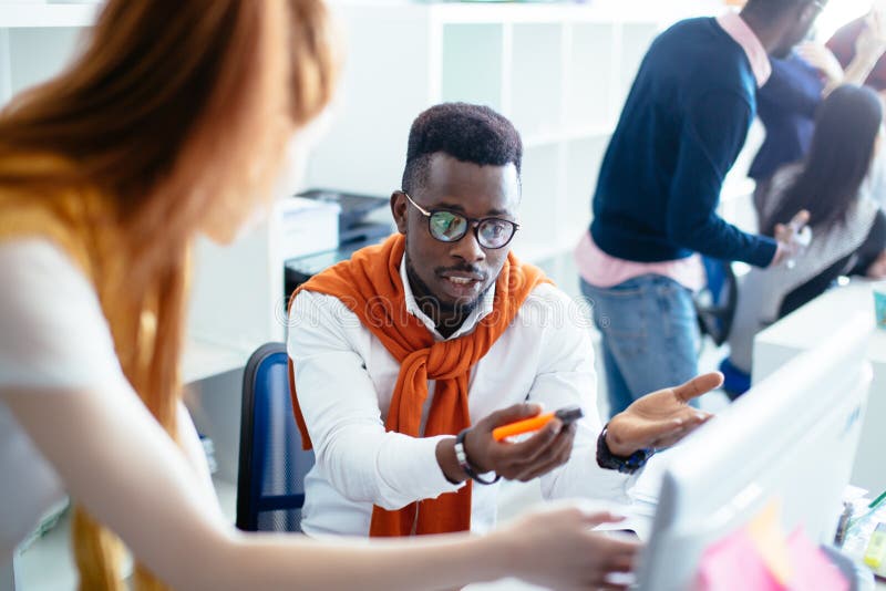 Closeup Portrait of Puzzled Man Sitting at Workplace in Front of ...