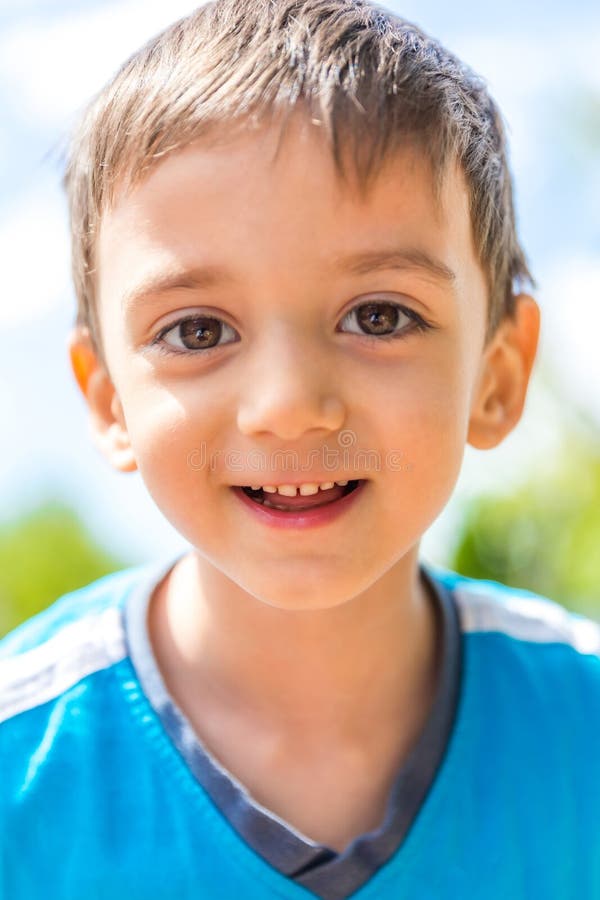 Close Up Portrait of a Smiling Boy Against Sun Stock Image - Image of ...