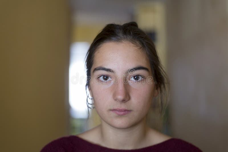 Closeup Portrait of a Young Woman Looking Camera Stock Photo - Image of ...
