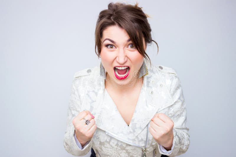 Closeup Pose of an Angry Woman Screaming in the White Elegant Jacket ...