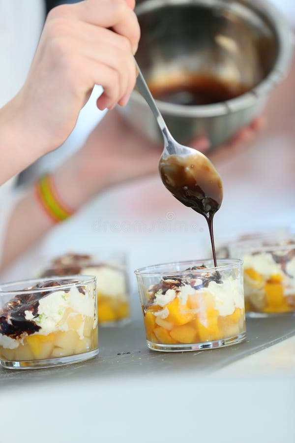 Closeup of Pouring Chocolate on Desserts Stock Photo - Image of cuisine ...