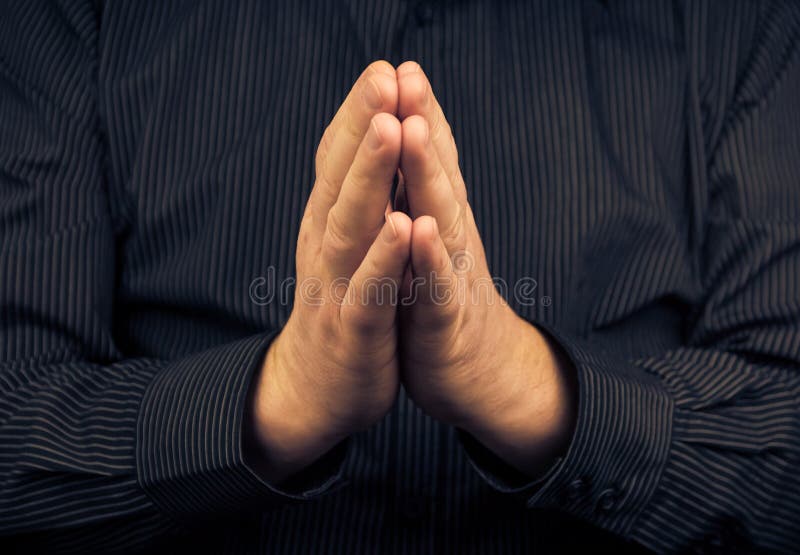 Man with Hands Folded in Prayer Stock Photo - Image of prayer, thought ...