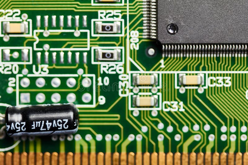 Closeup of Printed Circuit Board with Microchip, Capacitor and Other ...