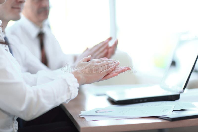 Closeup. Professional Business Team Applauding the Speaker Stock Image ... Closeup. Professional Business Team Applauding the Speaker Stock Image ...
