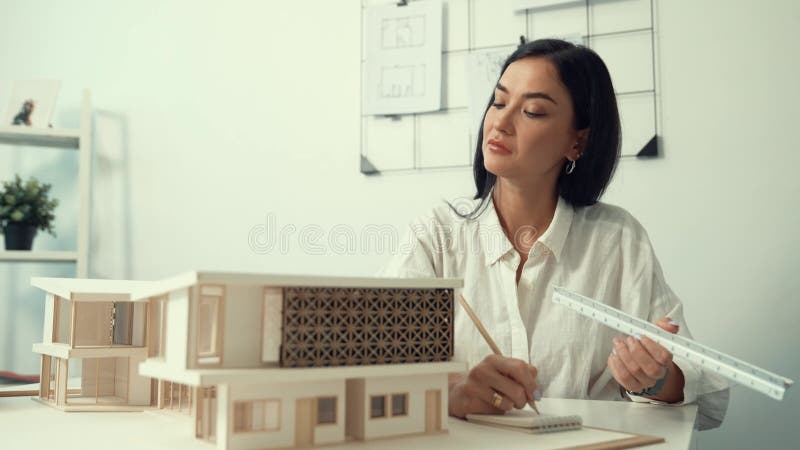 Professional Architect Using Triangular Scale Measure House Model ...