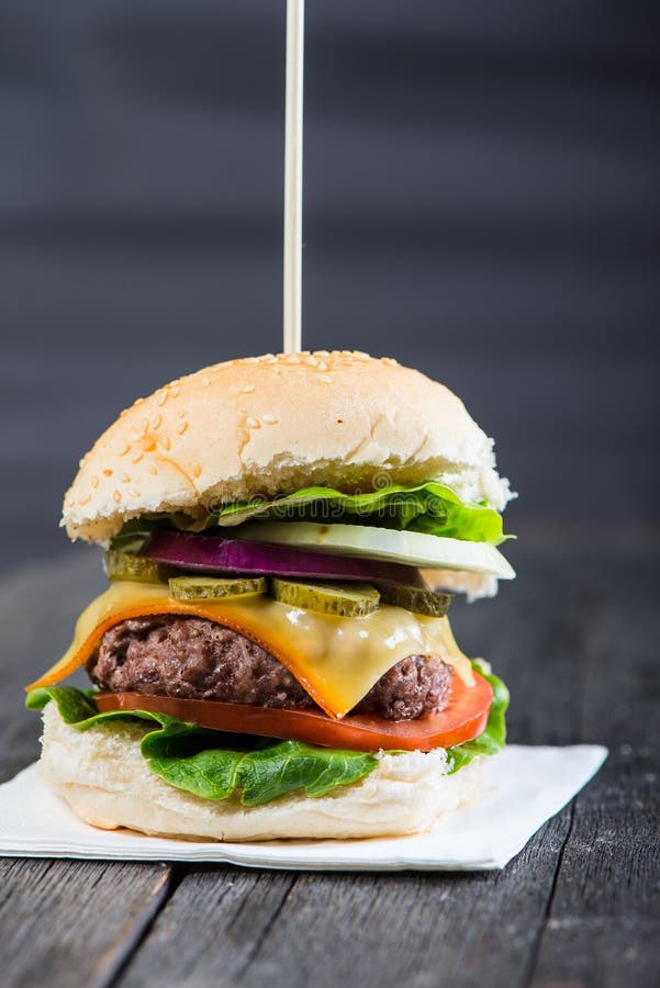 Closeup Pub Style Burger on Table Stock Photo - Image of snack, fresh ...