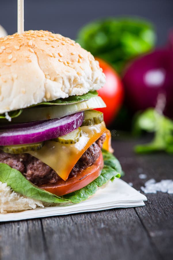 Closeup Pub Style Burger on Table Stock Photo - Image of fast, cheese ...