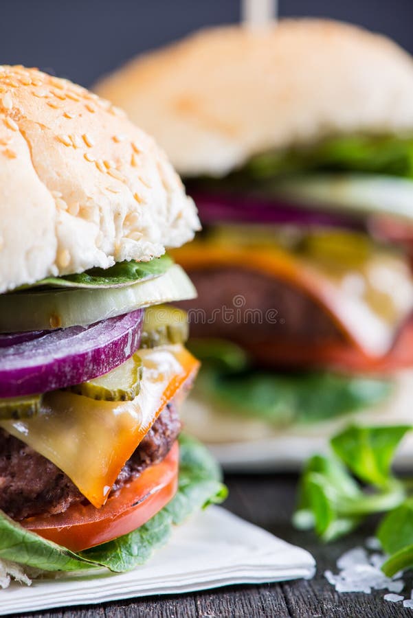 Closeup Pub Style Burger on Table Stock Photo - Image of delicious ...