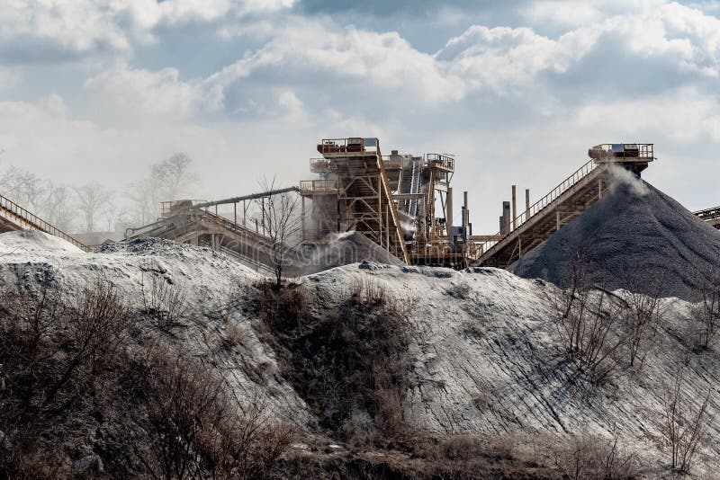 Mining in the Granite Quarry. Working Mining Machine - Old Crane Stock ...