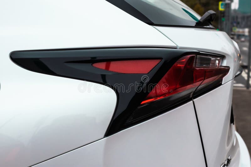 Closeup of Rear Red Taillight on White Suv. Back Lights of Modern Car ...