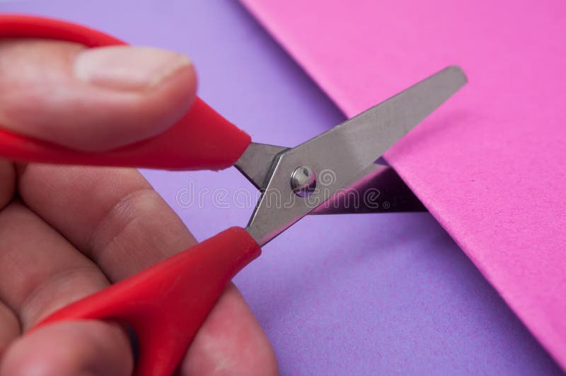Red Scissors in Hand Cutting Colored Paper Stock Image - Image of craft ...