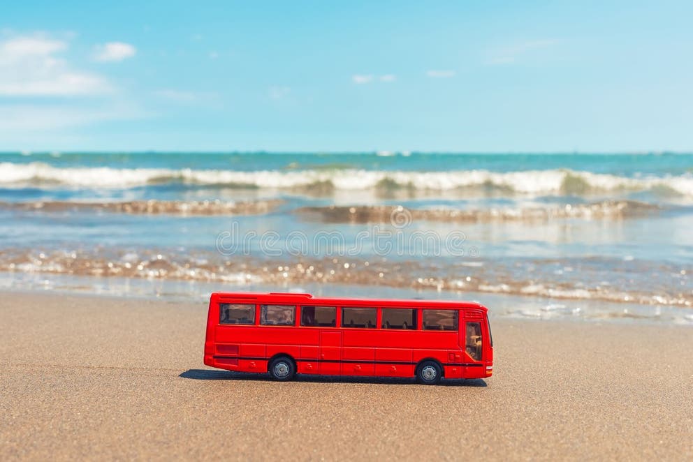Closeup of a Red Toy Bus on the Sandy Beach Stock Photo - Image of ...