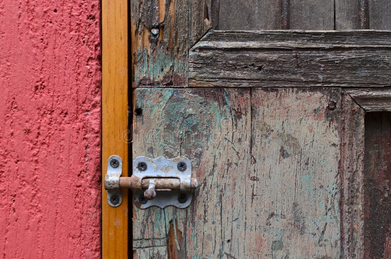 Closeup of Red Wall and Vintage Door Locked with Latch Stock Image ...