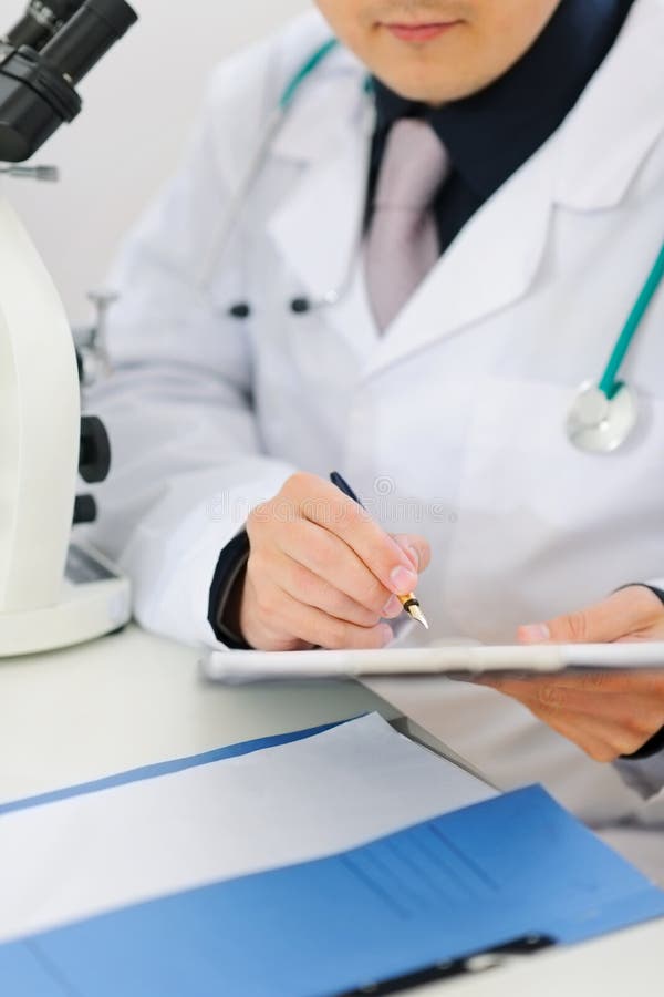 Closeup on Researcher Making Notes in Clipboard Stock Photo - Image of ...