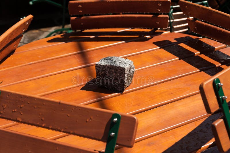 A Restaurant Table with a Granite Stone in the Middle Stock Image ...