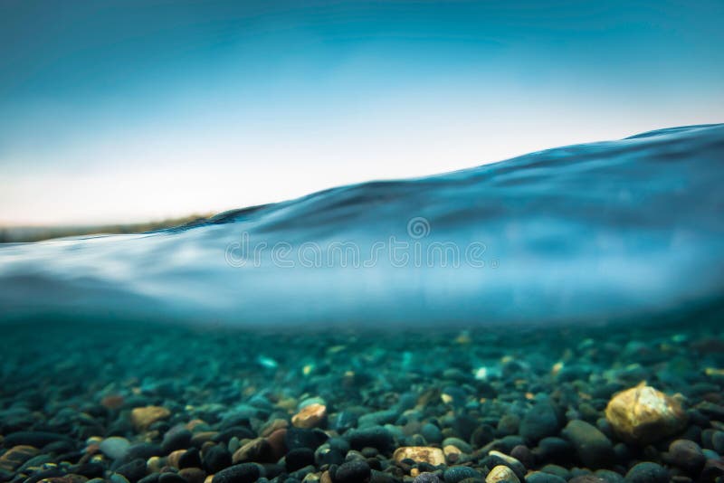 Closeup of Rocks Under Blue Water Stock Photo - Image of turquoise ...