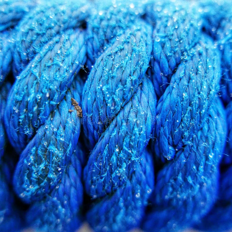 Closeup of a Rolled Blue Rope Stock Image - Image of thread, blurry ...
