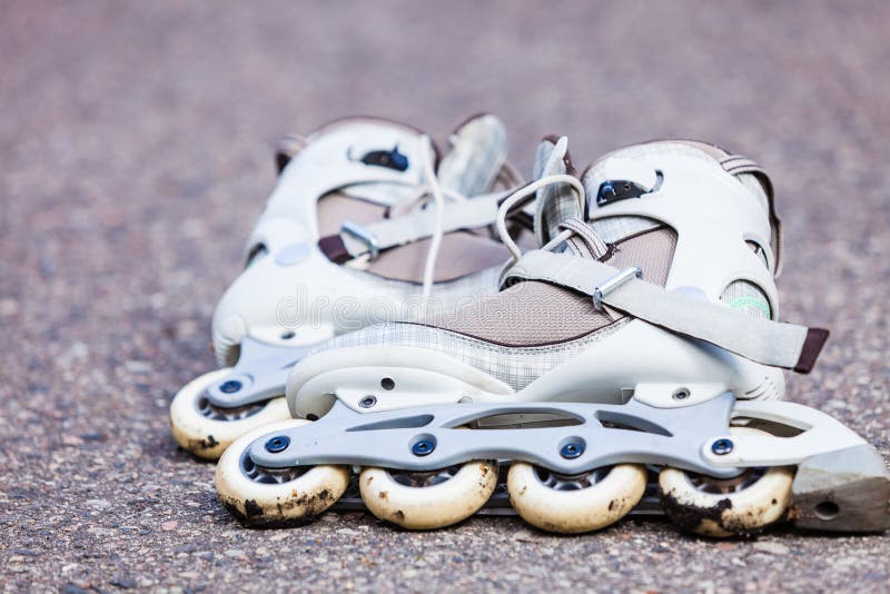 Closeup Roller Skates on Asphalt. Stock Photo - Image of female, inline ...
