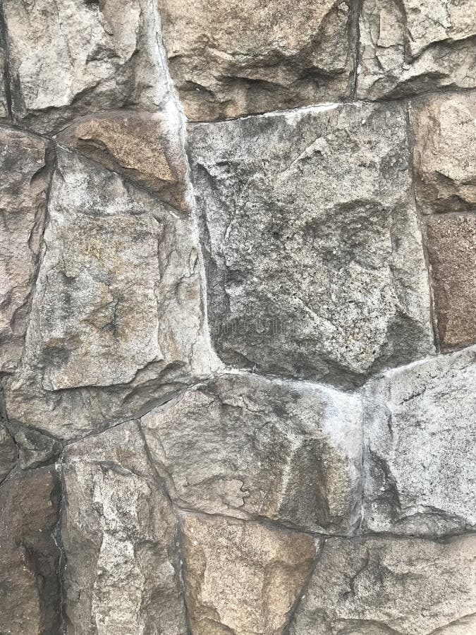 Closeup of a Rough Stone Wall Stock Image - Image of rock, nature ...