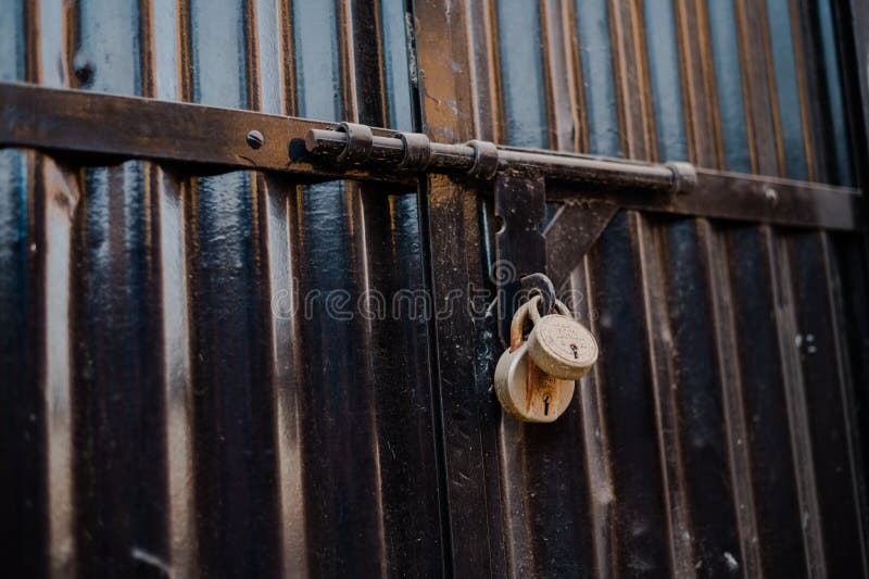 Closeup of Round-shaped Locks on a Black Metallic Gate Stock Image ...