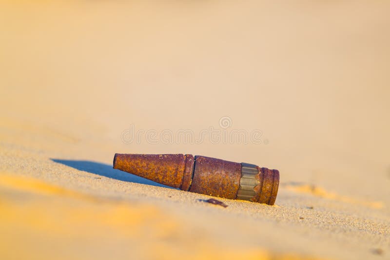 Closeup Rusty Bullet Lie on the Sand Stock Image - Image of friable ...