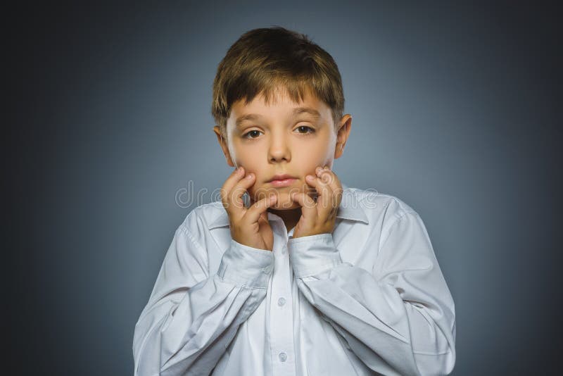 Closeup Sad Boy with Worried Stressed Face Expression Stock Photo ...