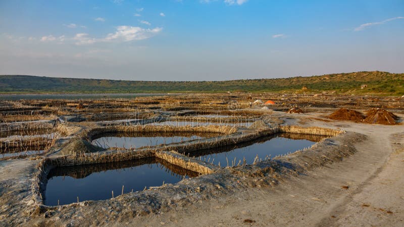 Closeup of Saltmine at Dusk with Workers Stock Photo - Image of dusk ...