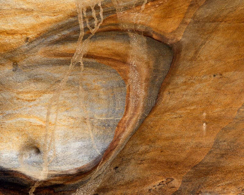 Patterns in cliff rock stock photo. Image of weathered - 64247994