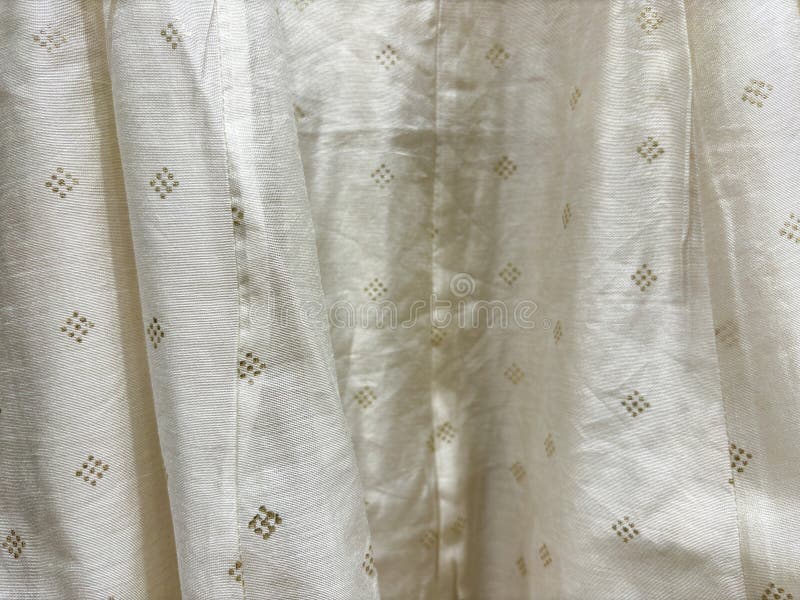 Closeup of a Satin Cream Colour Curtain with Elegant Dotted Design ...