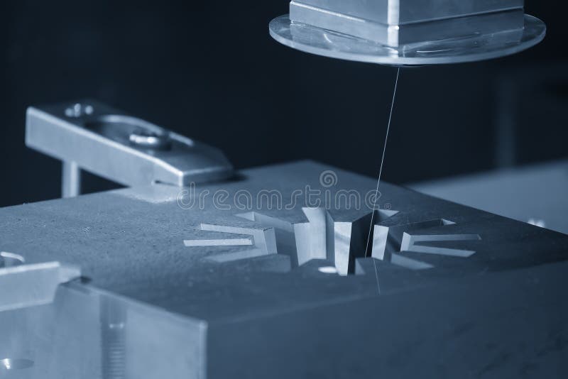 Closeup Scene the Wire EDM Machine Cutting the Mold Insert Parts Stock ...