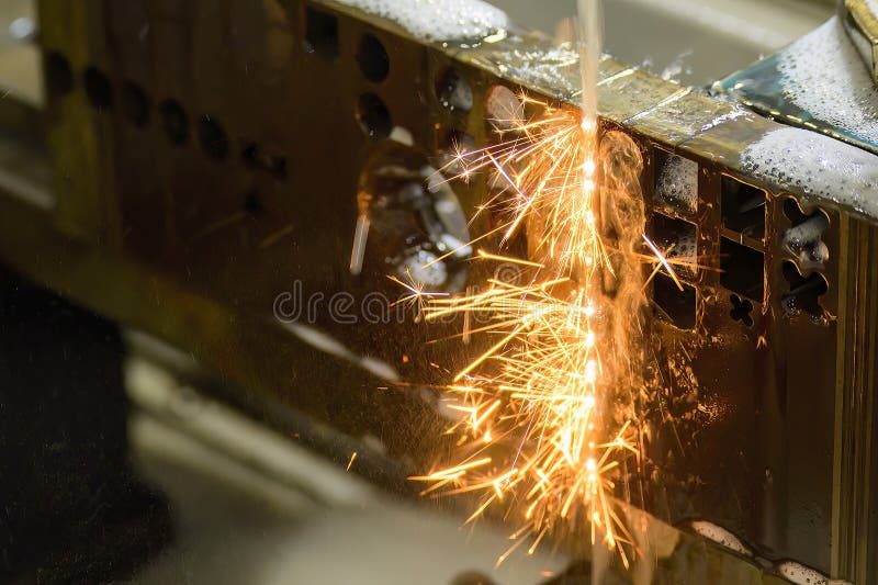 Closeup Scene the Wire EDM Machine Cutting the Mold Insert Parts Stock ...