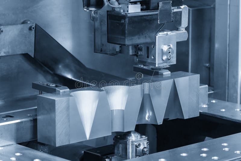 Closeup Scene the Wire EDM Machine Cutting the Mold Insert Parts Stock ...