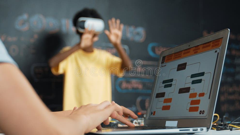 Closeup of School Girl Hand Coding Program while Student Using VR ...