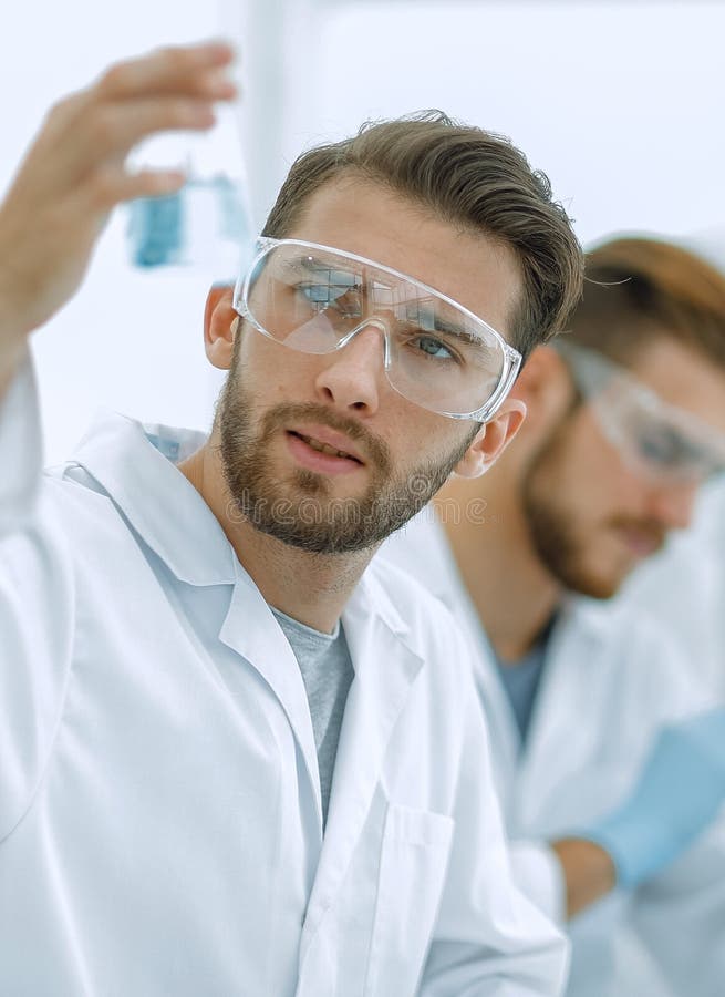 Closeup.scientists in the Laboratory Stock Photo - Image of face, flask ...