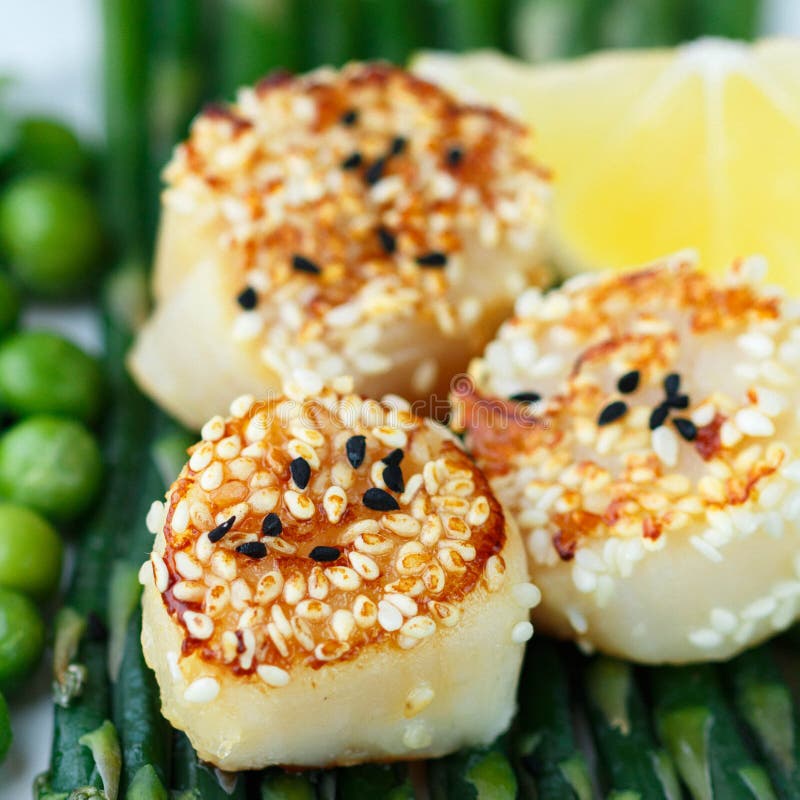 Scallops with Sesame Seeds , Asparagus, Lemon and Green Peas Stock ...