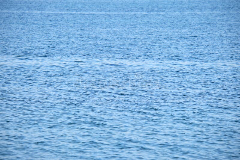 Closeup Seascape Surface of Blue Sea Water with Small Ripple Waves ...