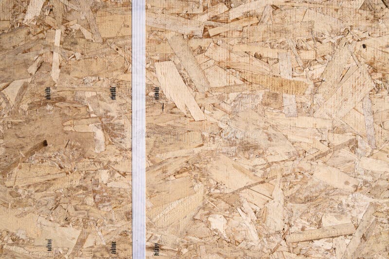 Closeup of a Section of New Oriented Strand Board (OSB) Engineered Wood ...